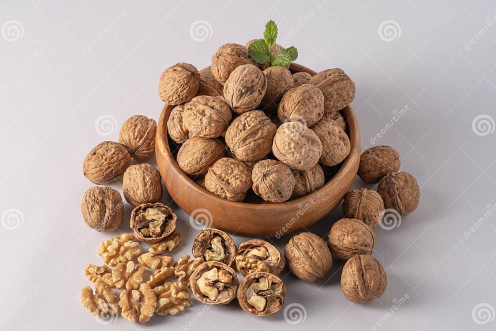 Bowl of Walnuts with Cracked Shells on White Background Stock Image ...
