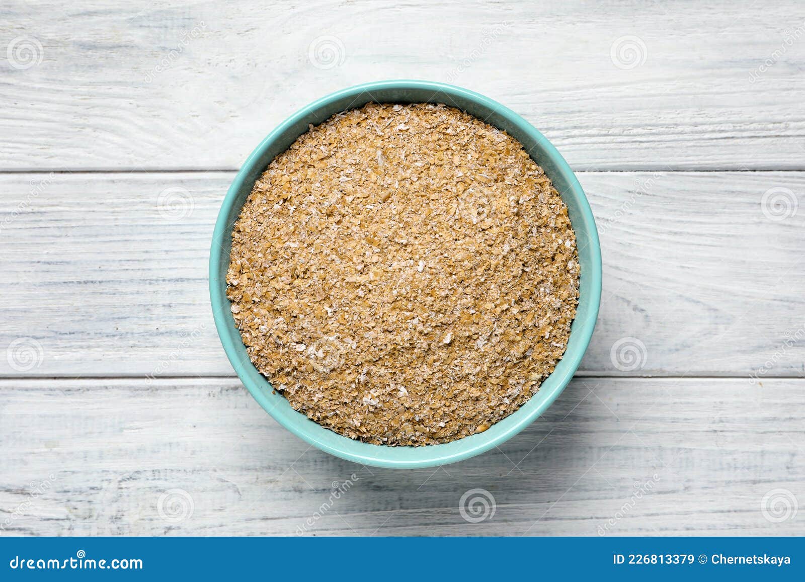Bowl of Wheat Bran on White Wooden Table, Top View Stock Image - Image ...