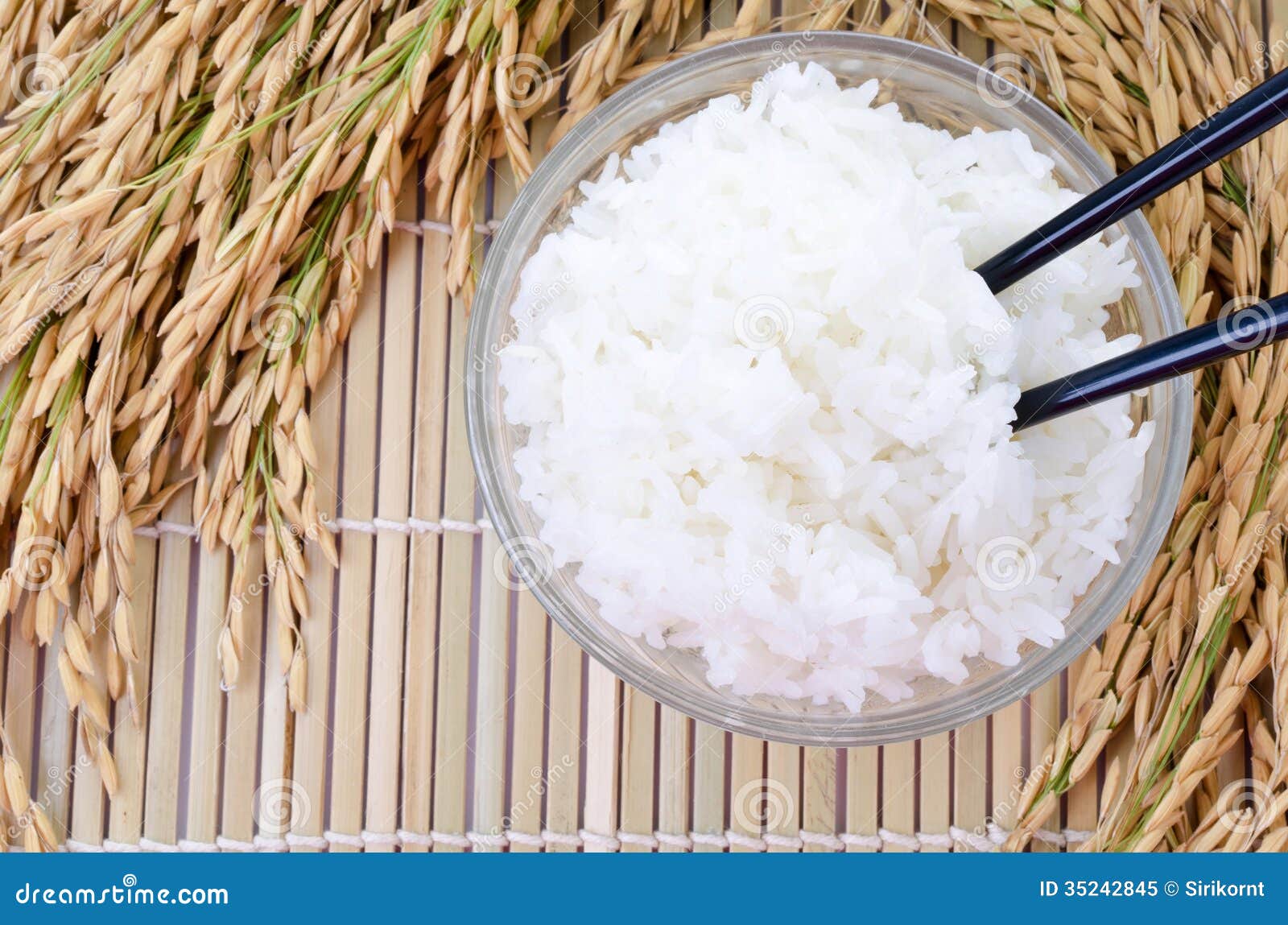 Bowl of White Steamed Rice with Chopsticks on Bamboo Mat.with Pa Stock ...