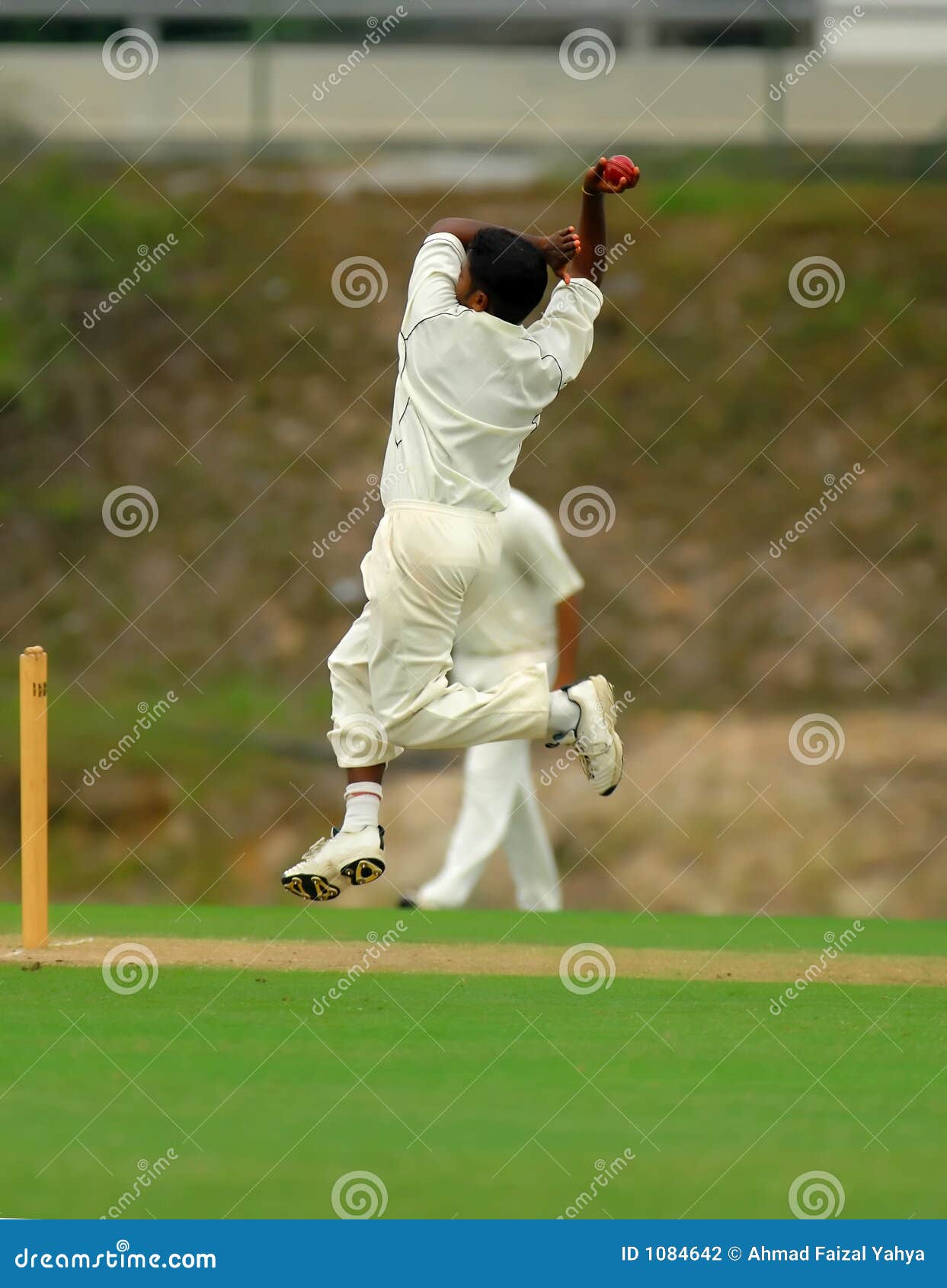 A bowler stock photo. Image of stump, jump, jumping, jumped - 1084642
