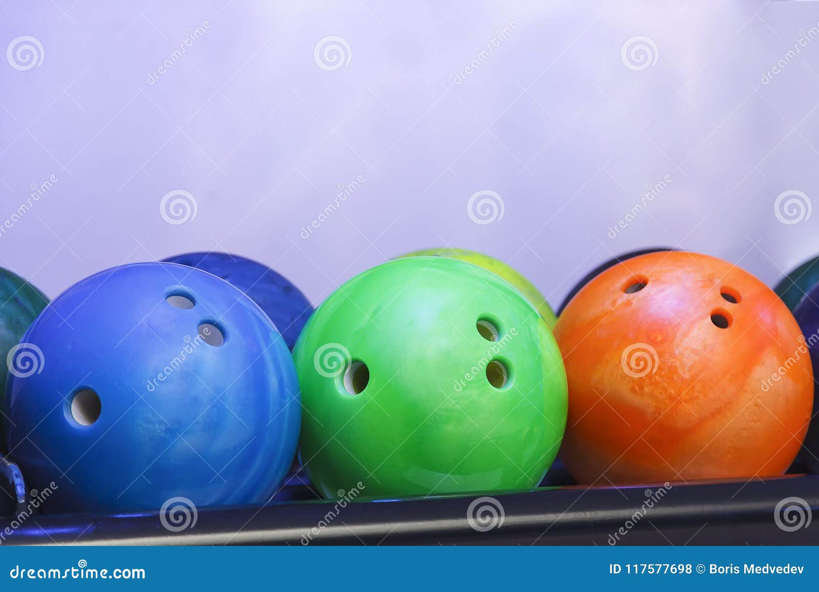 Bowling balls on the wall stock photo. Image of competition - 117577698