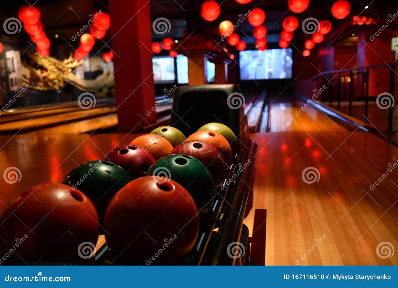 Bowling Lane and Balls in the Row in Bowling Center. Stock Photo ...