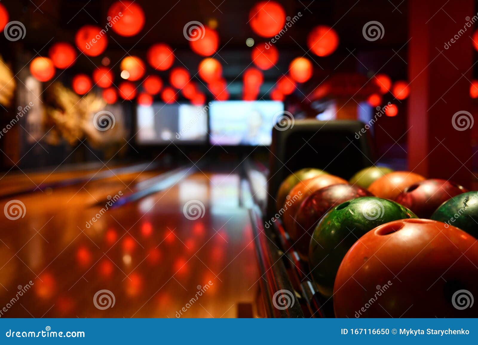 Bowling Lane and Balls in the Row in Bowling Center. Stock Photo ...