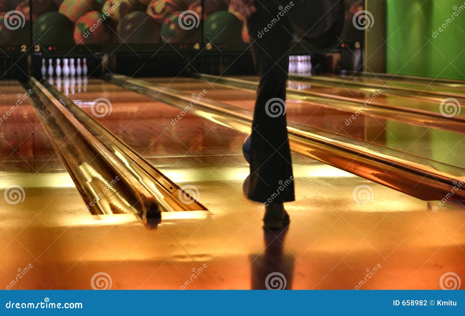 Bowling Ball Going Down Lane