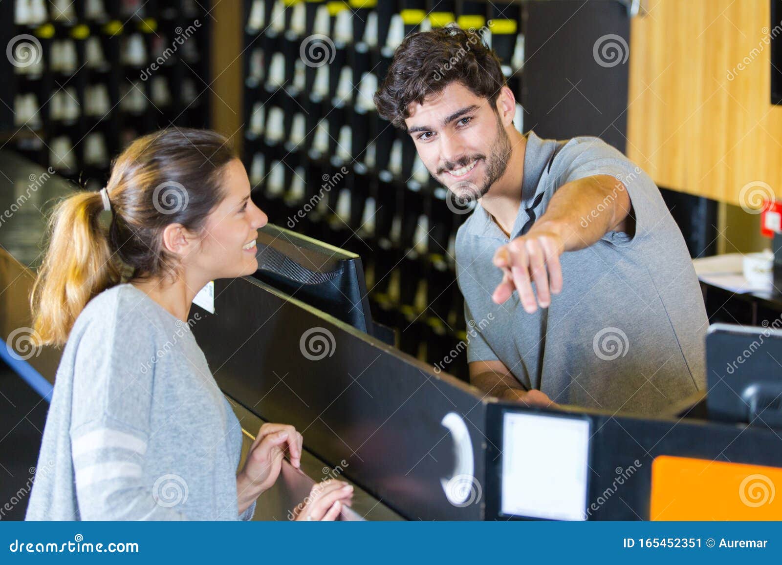 Bowling Worker Giving Directions To Customer Stock Image - Image of ...