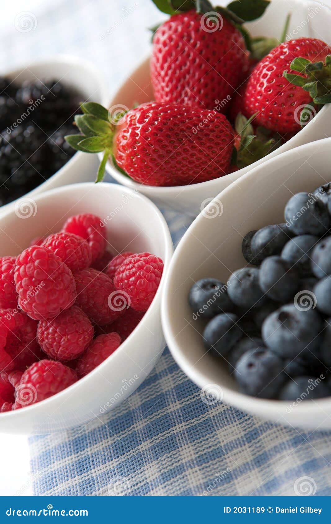 Bowls of berry goodness stock image. Image of closeup - 2031189