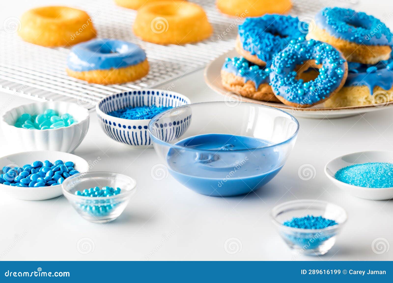 Bowls of Sprinkles and Melted Chocolate Ready for Making Blue Decorated ...