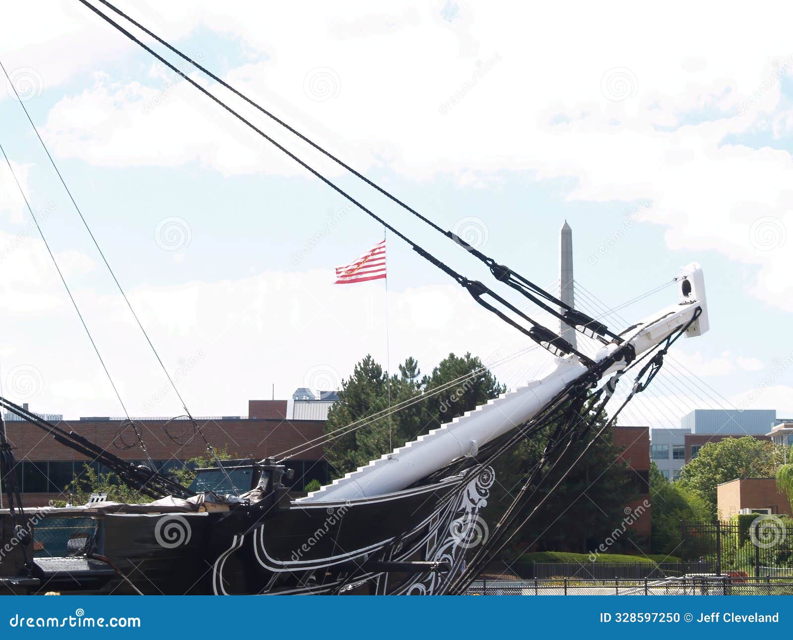Bowsprit of the USS Constitution with Buildings and Bridge in ...