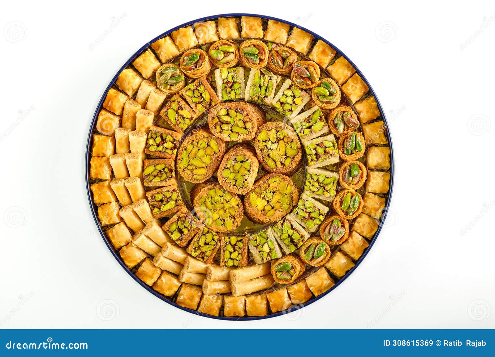 A Box of Assorted Arabic Sweets with Pistachios Stock Image - Image of ...