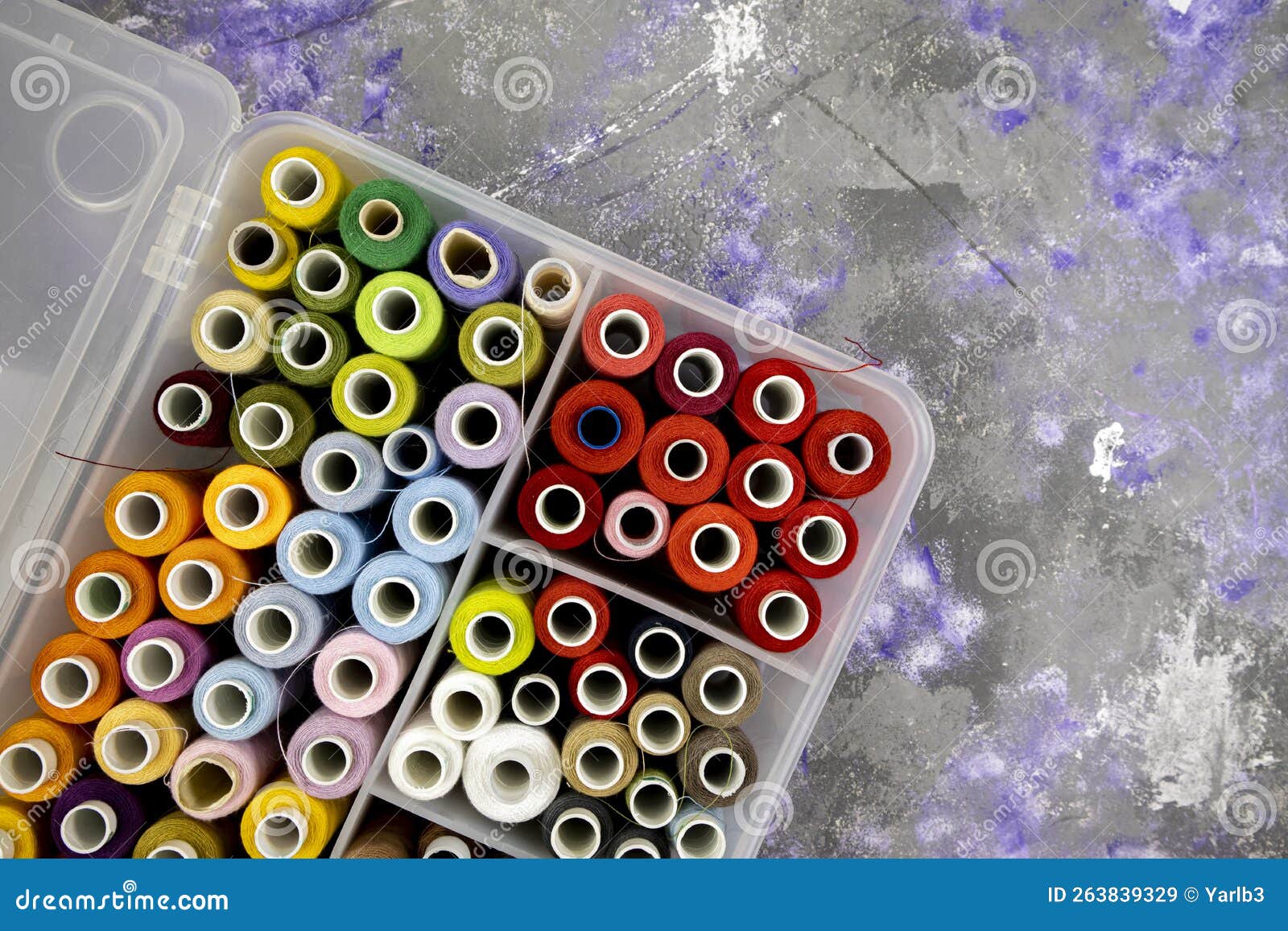 Box with Bright Colored Threads on an Abstract Background, Top View ...