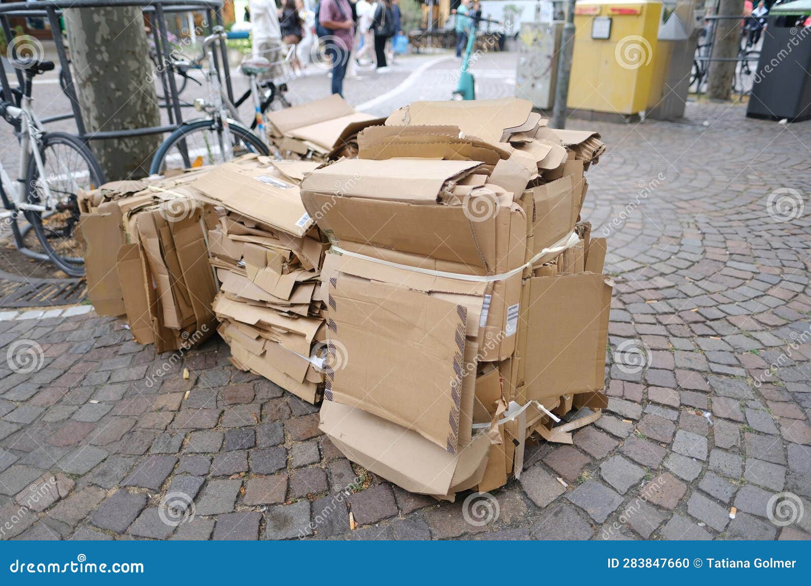 Box with Cardboard Packages on Street, Sheets of Used Paper for ... Box with Cardboard Packages on Street, Sheets of Used Paper for ...
