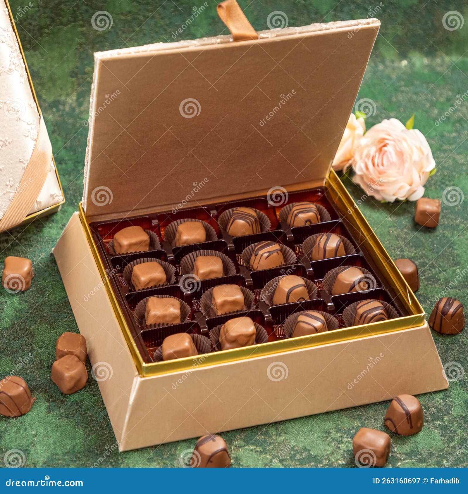 Box of Chocolate on Green Background Stock Image - Image of confection ...
