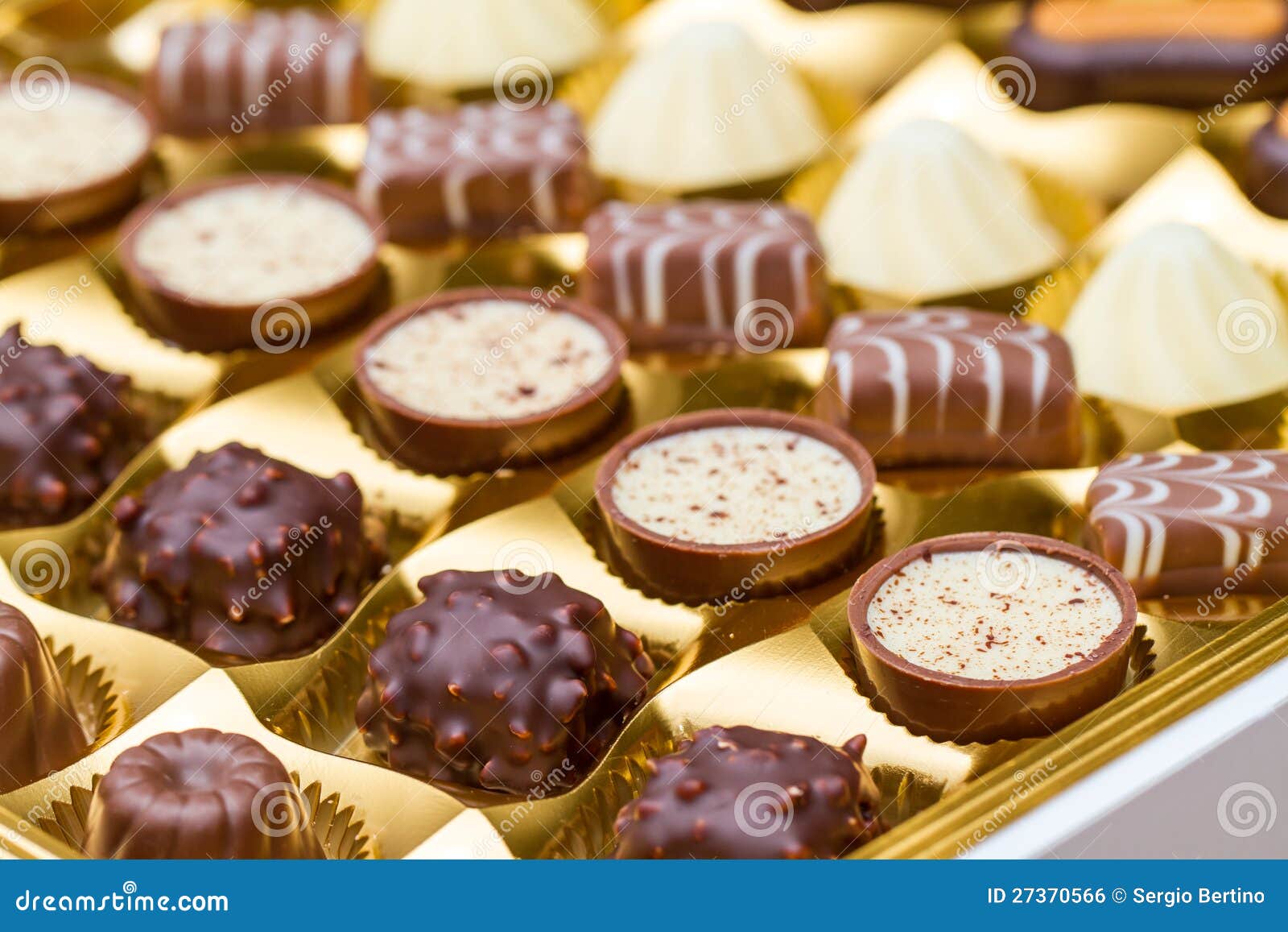 Box of chocolate pralines stock photo. Image of lines - 27370566