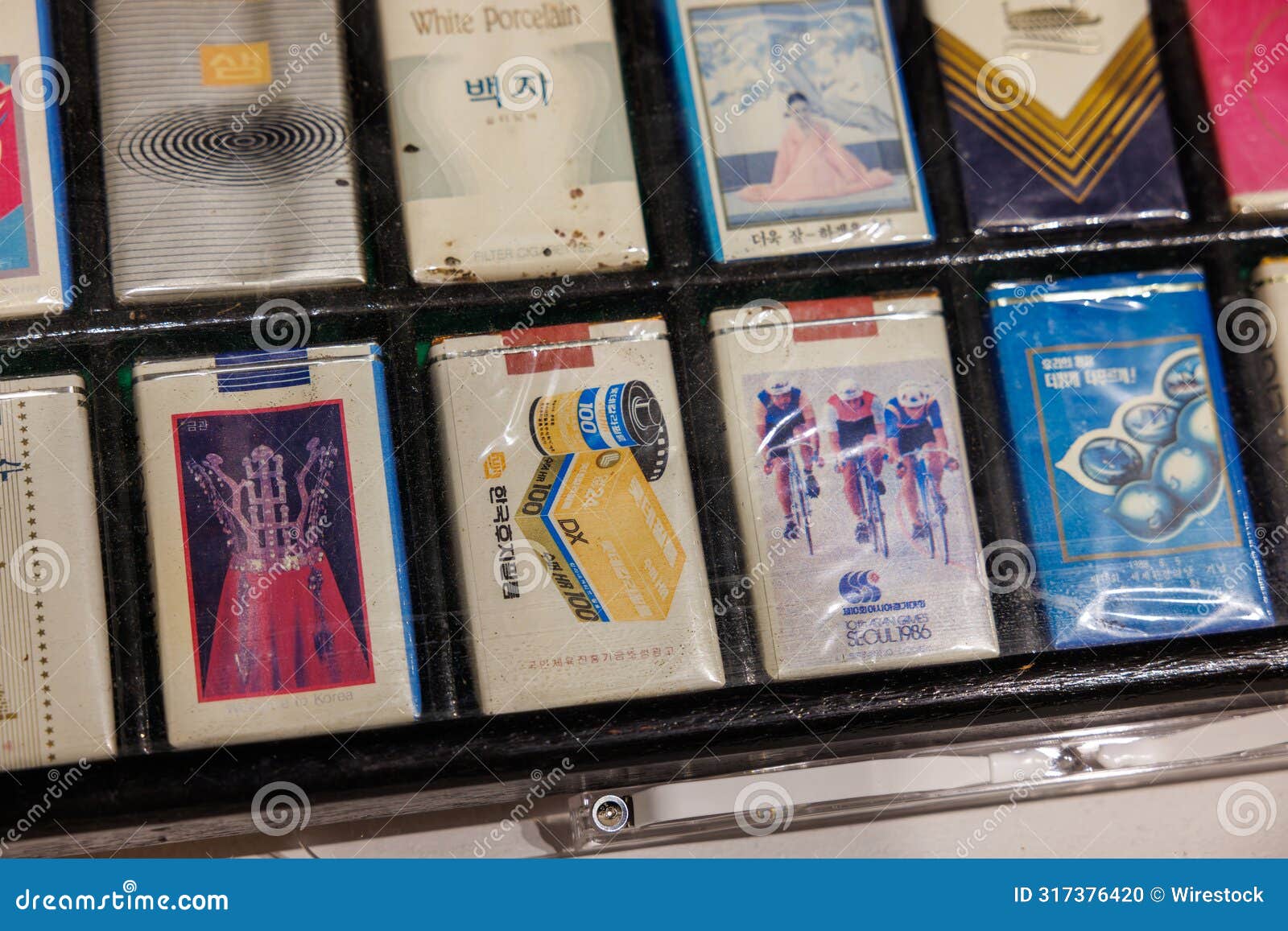Box of Cigarettes in Plastic Cases on Display Editorial Image - Image ...