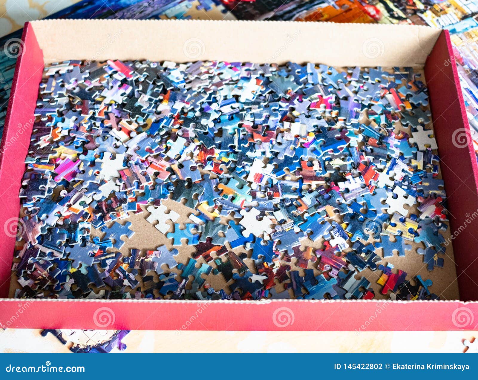 Box with Disassembled Jigsaw Puzzle Board Game Stock Photo - Image of ...