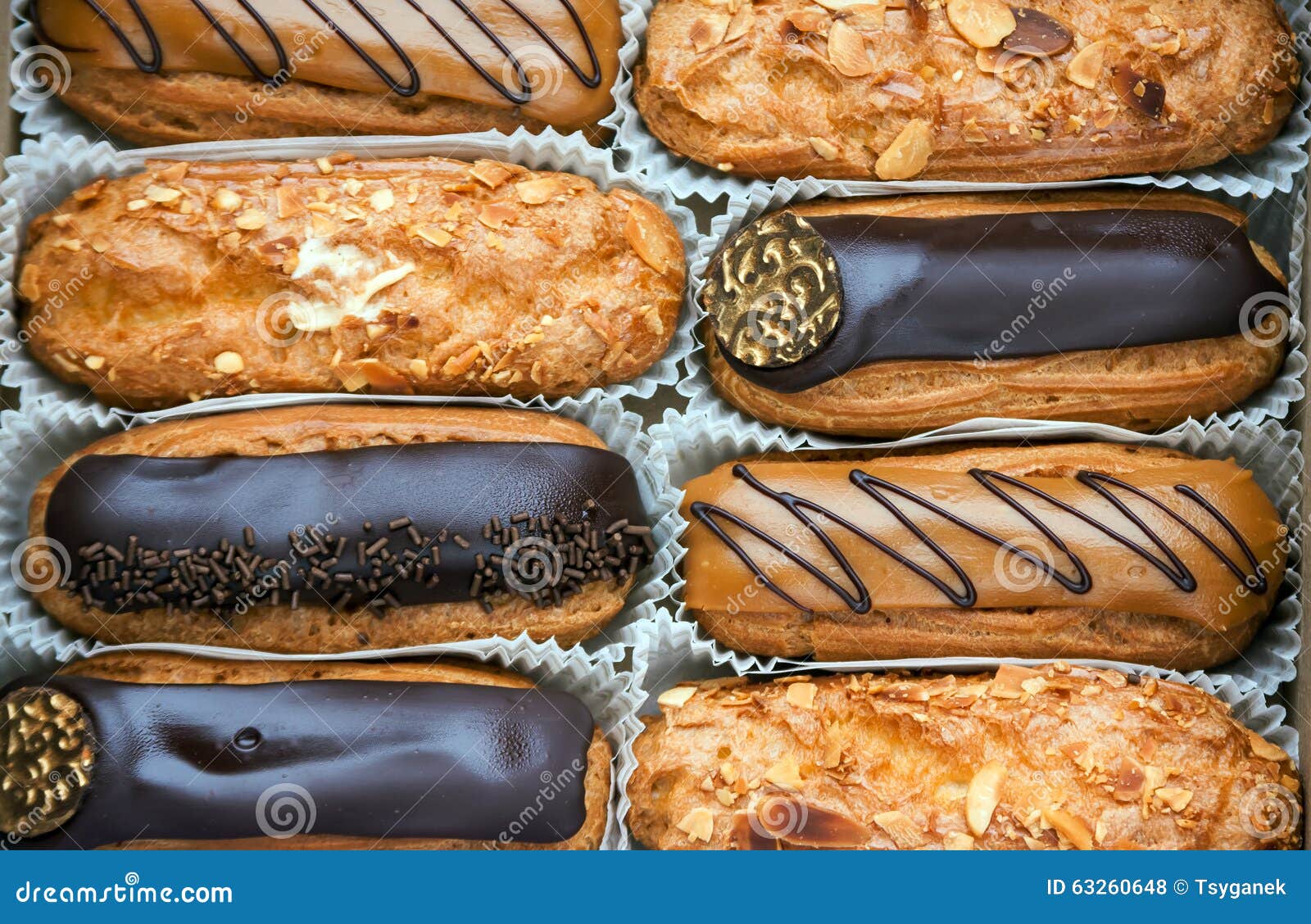 A box of eclairs stock photo. Image of cooking, nuts - 63260648