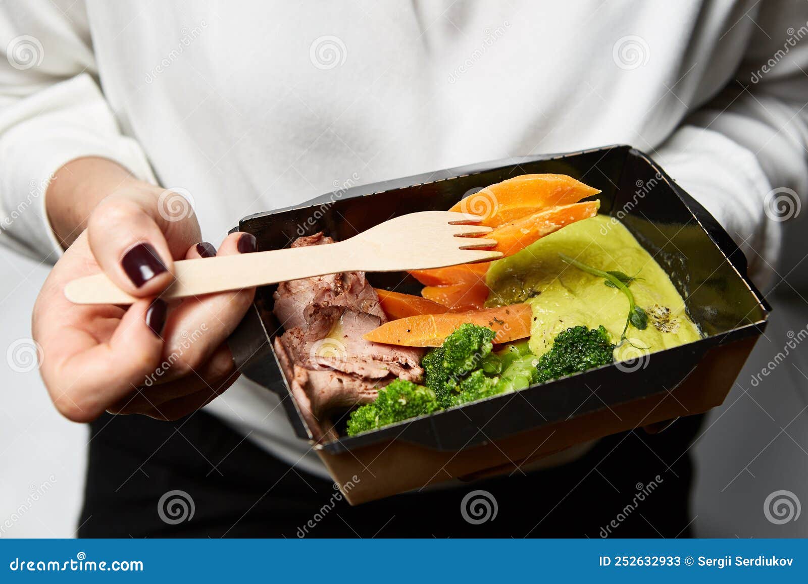 A Box of Food in the Hands of a Waiter Stock Image - Image of concept ...