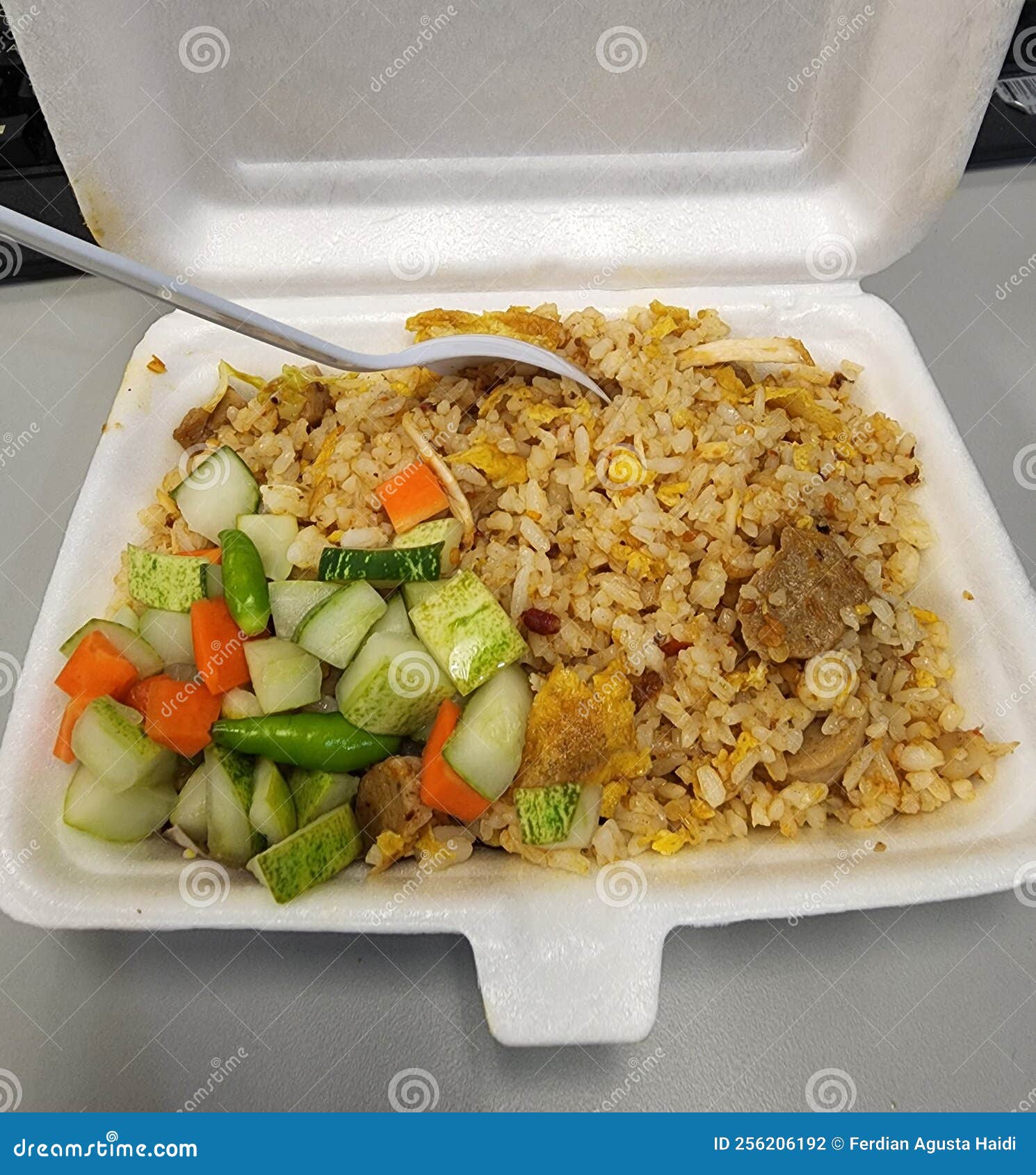 A Box of Fried Rice with Some Pickles Stock Photo - Image of rice ...