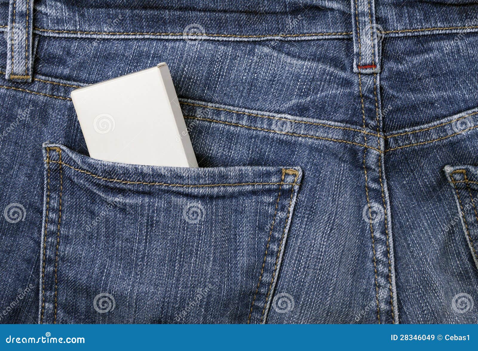 Box in the jeans pocket stock image. Image of pack, text - 28346049