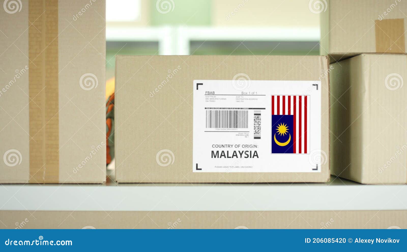A Box from Malaysia on the Shelf Stock Photo - Image of address, carton ...