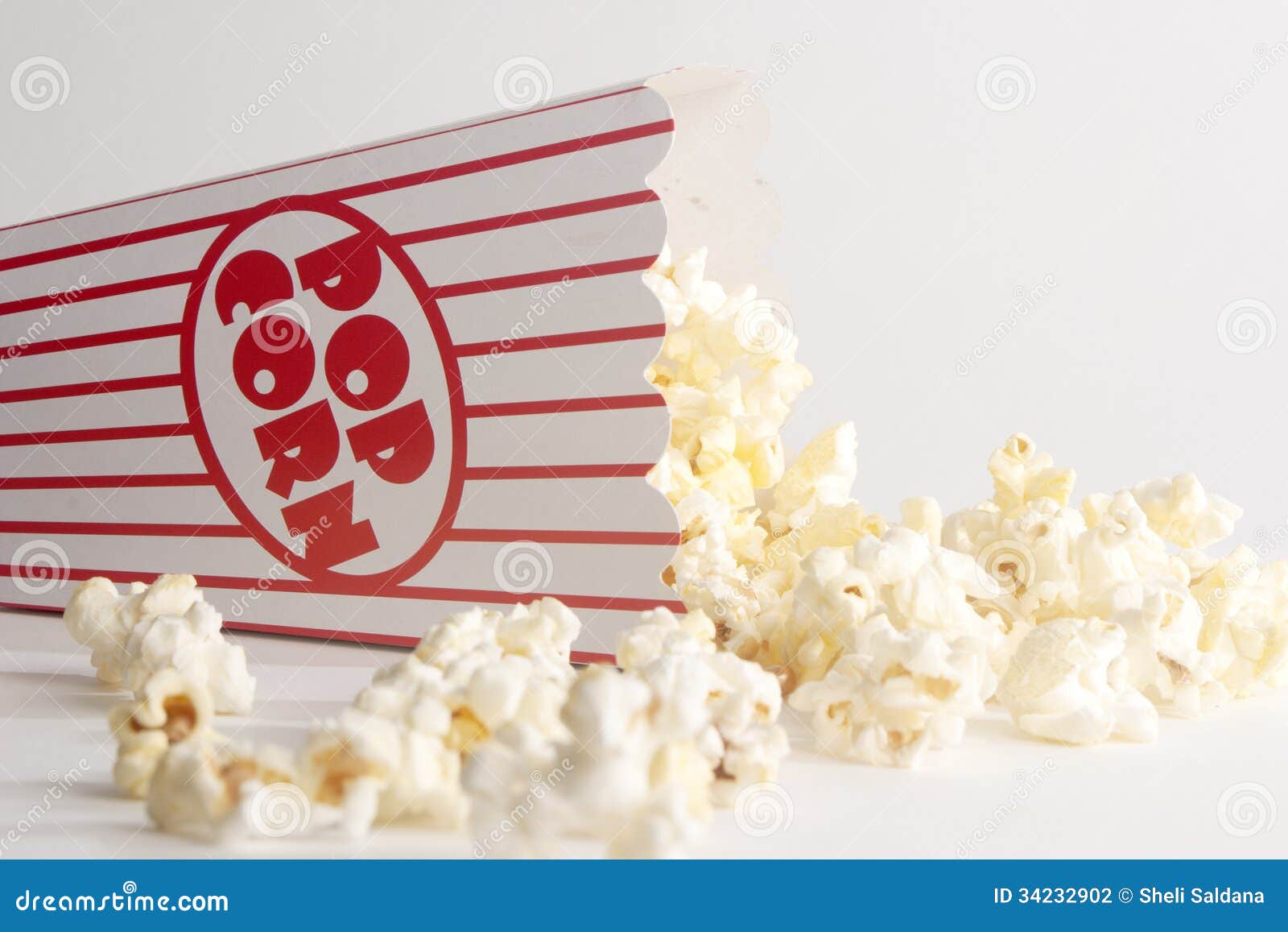 Box of Popcorn Toppled Over Stock Photo - Image of food, popping: 34232902
