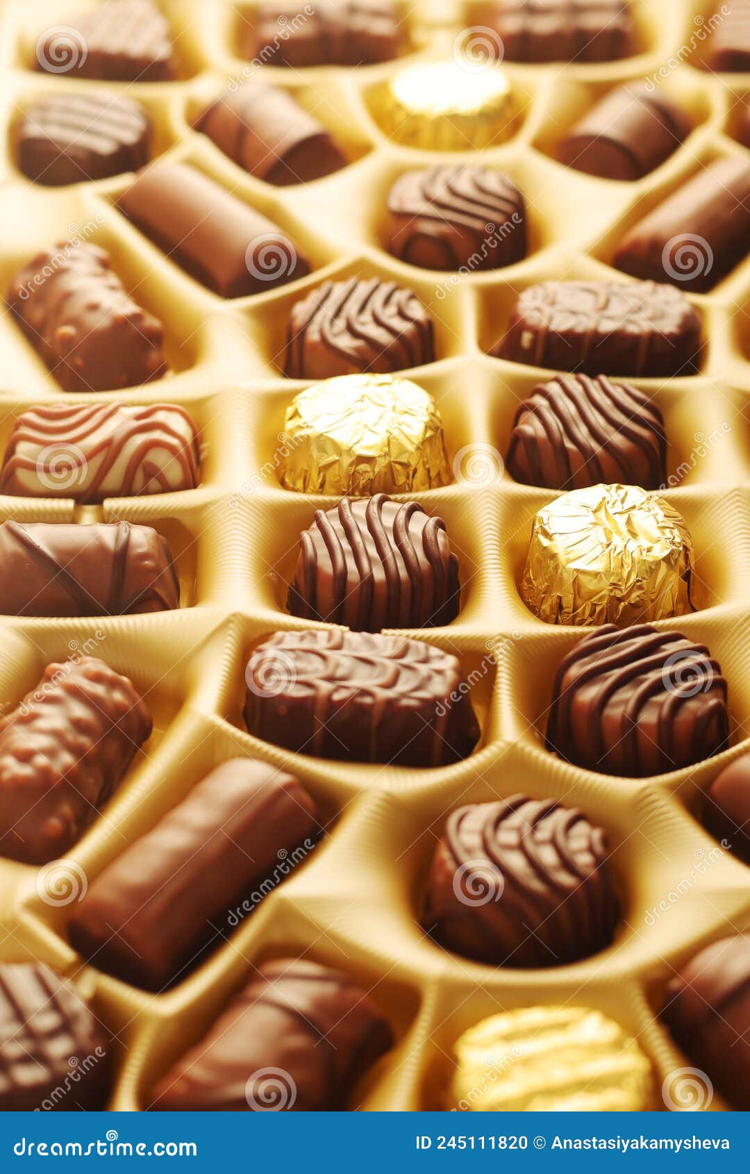 A Box with Praline Chocolates Stock Photo - Image of sweetener, golden ...