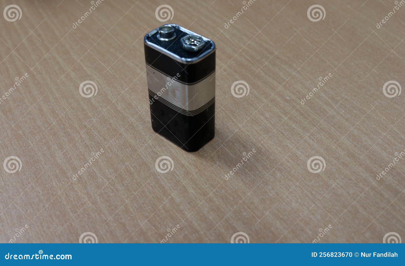 A Box-shaped Battery on the Table Stock Photo - Image of device, font ...