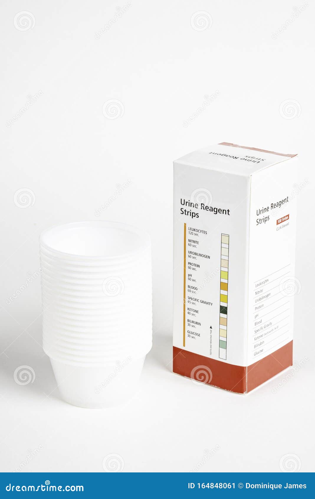 Urine Strips Box and a Stack of Plastic Containers Stock Image - Image ...