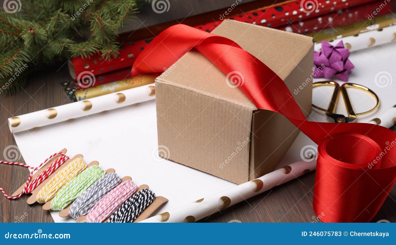 Box, Wrapping Paper and Scissors on Wooden Table Stock Image - Image of ...