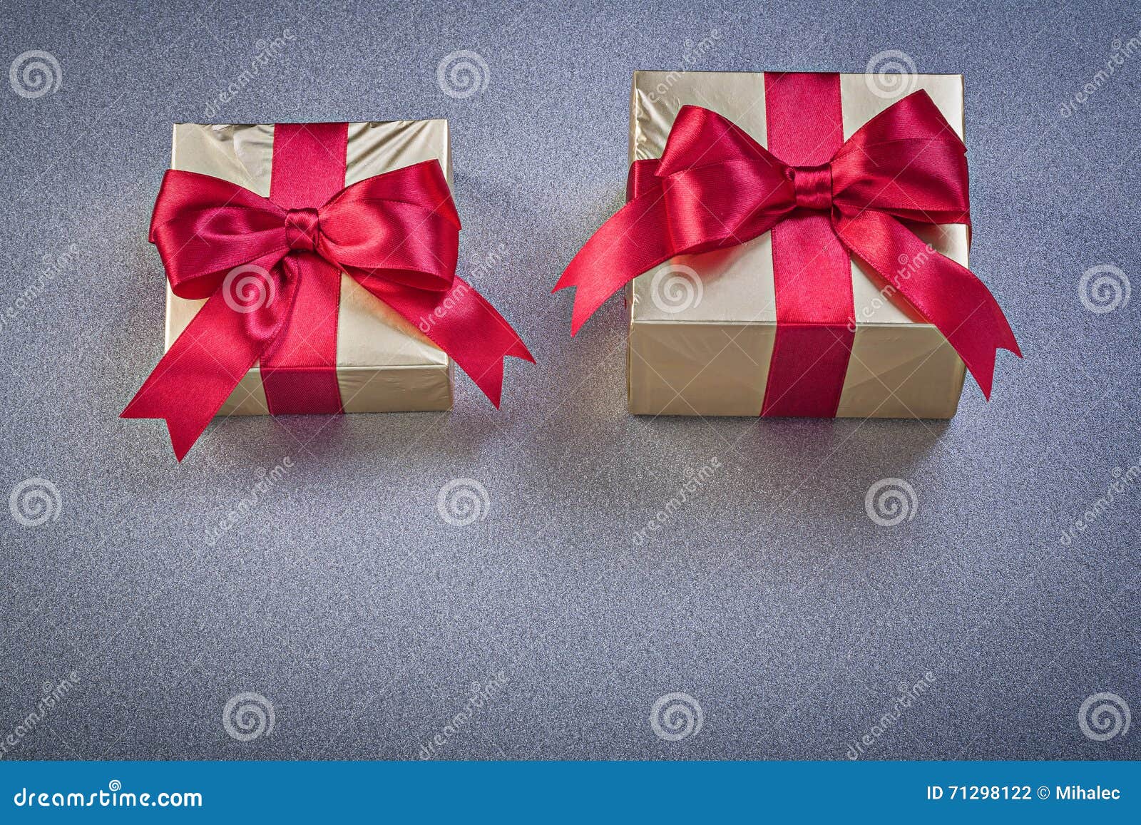Boxed Presents with Red Bows on Grey Background Holidays Concept Stock ...