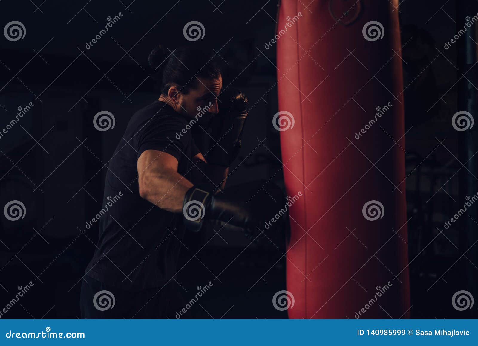 Boxer Hitting the Heavy Bag with Right Hook Stock Image - Image of ...