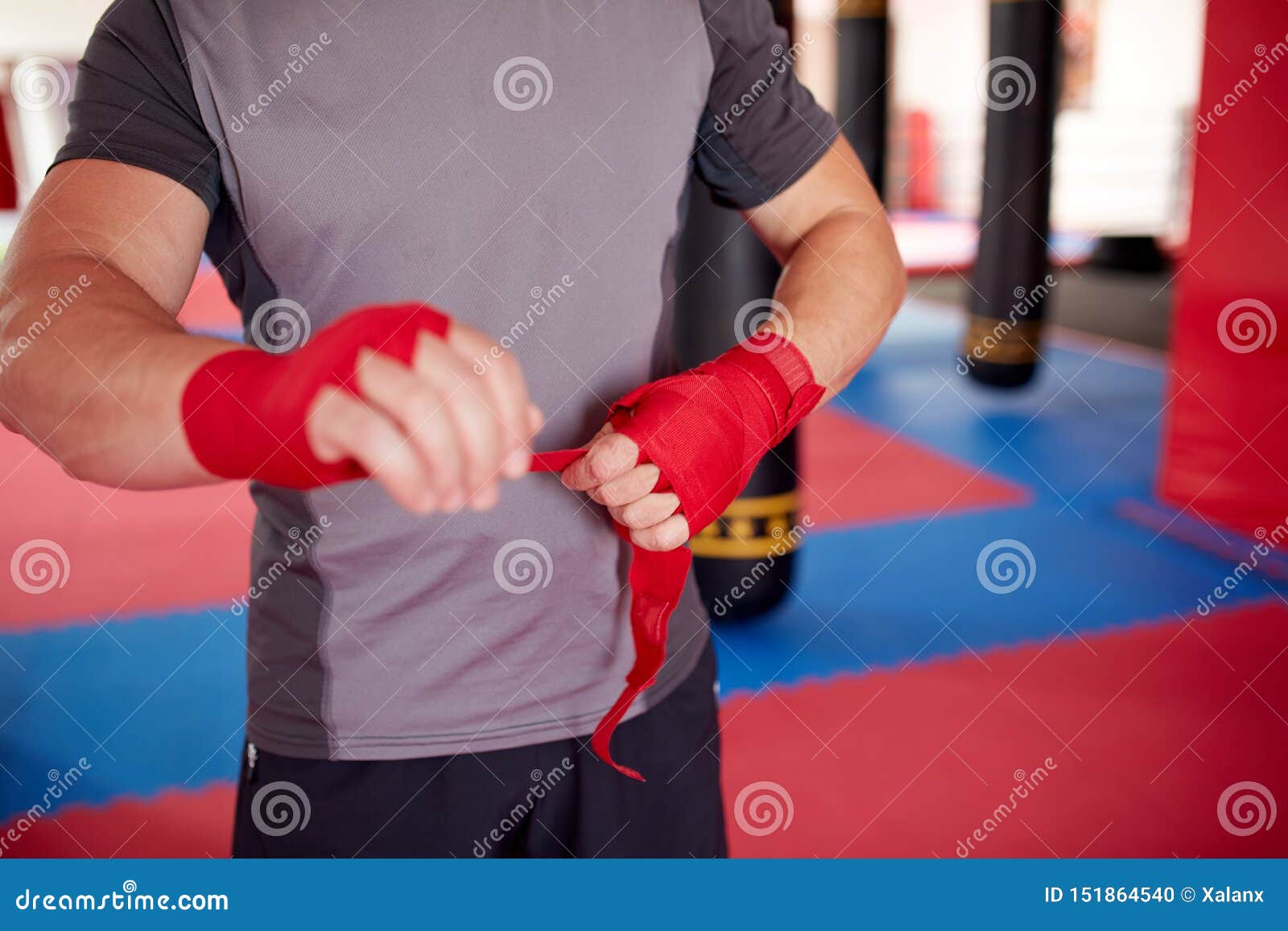 Boxer putting handwraps on stock photo. Image of activity - 151864540