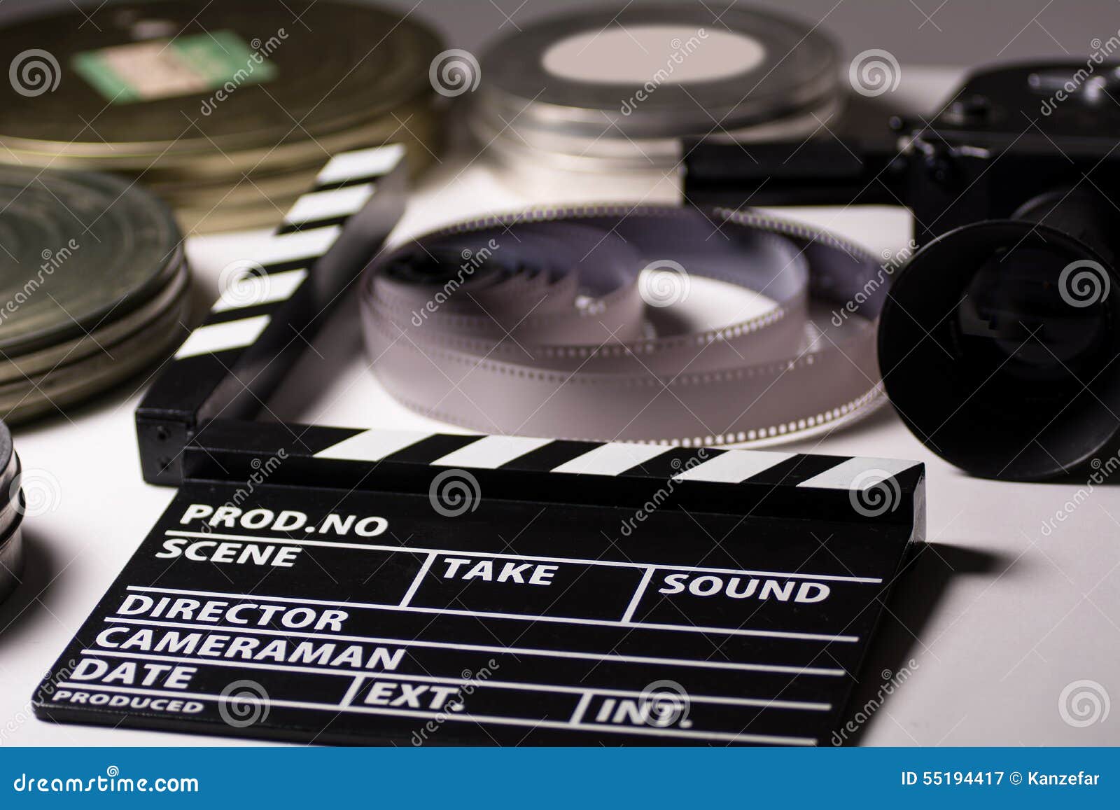 Boxes with the Camera Films and Cinema Clapper on the Table. Stock ...