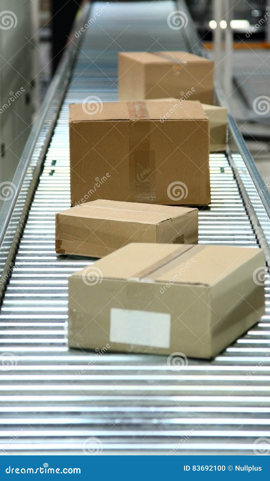 Boxes on Conveyor Belt stock photo. Image of parcel, delivering - 83692100