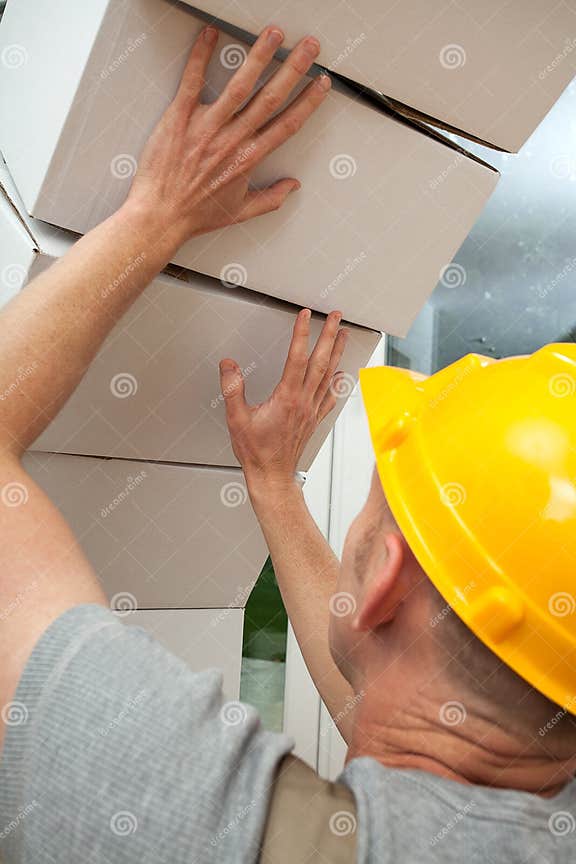 Boxes falling on worker stock image. Image of house, body - 35055831
