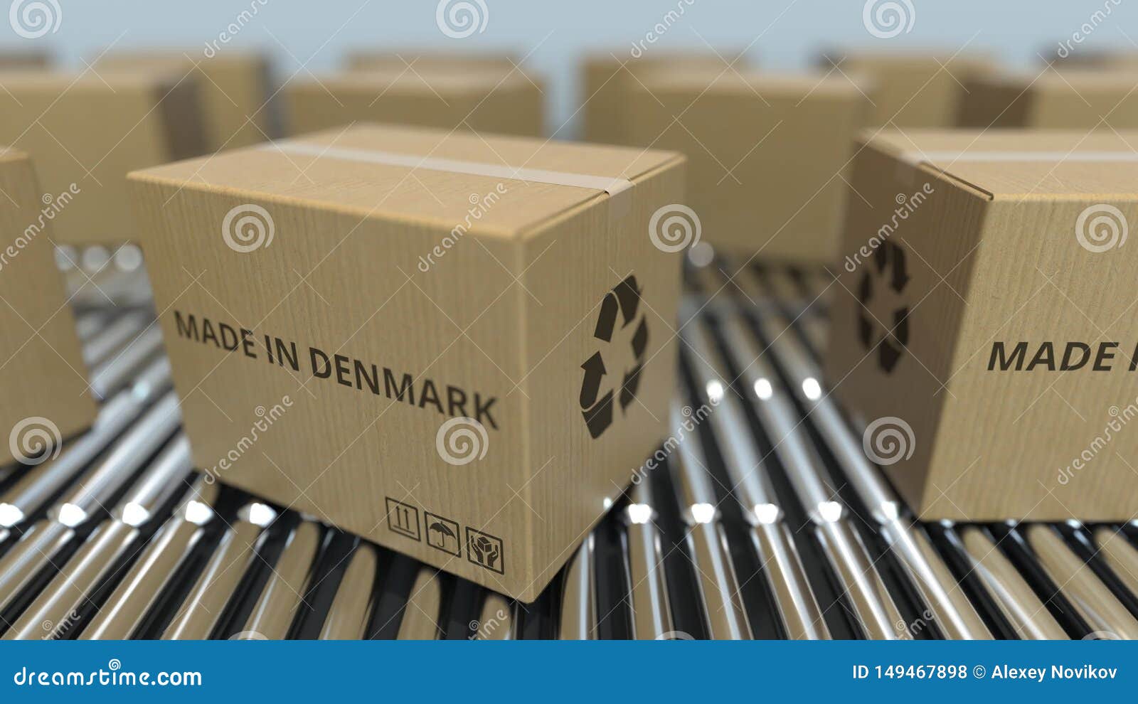 Boxes with MADE in DENMARK Text on Roller Conveyor. Danish Goods ...