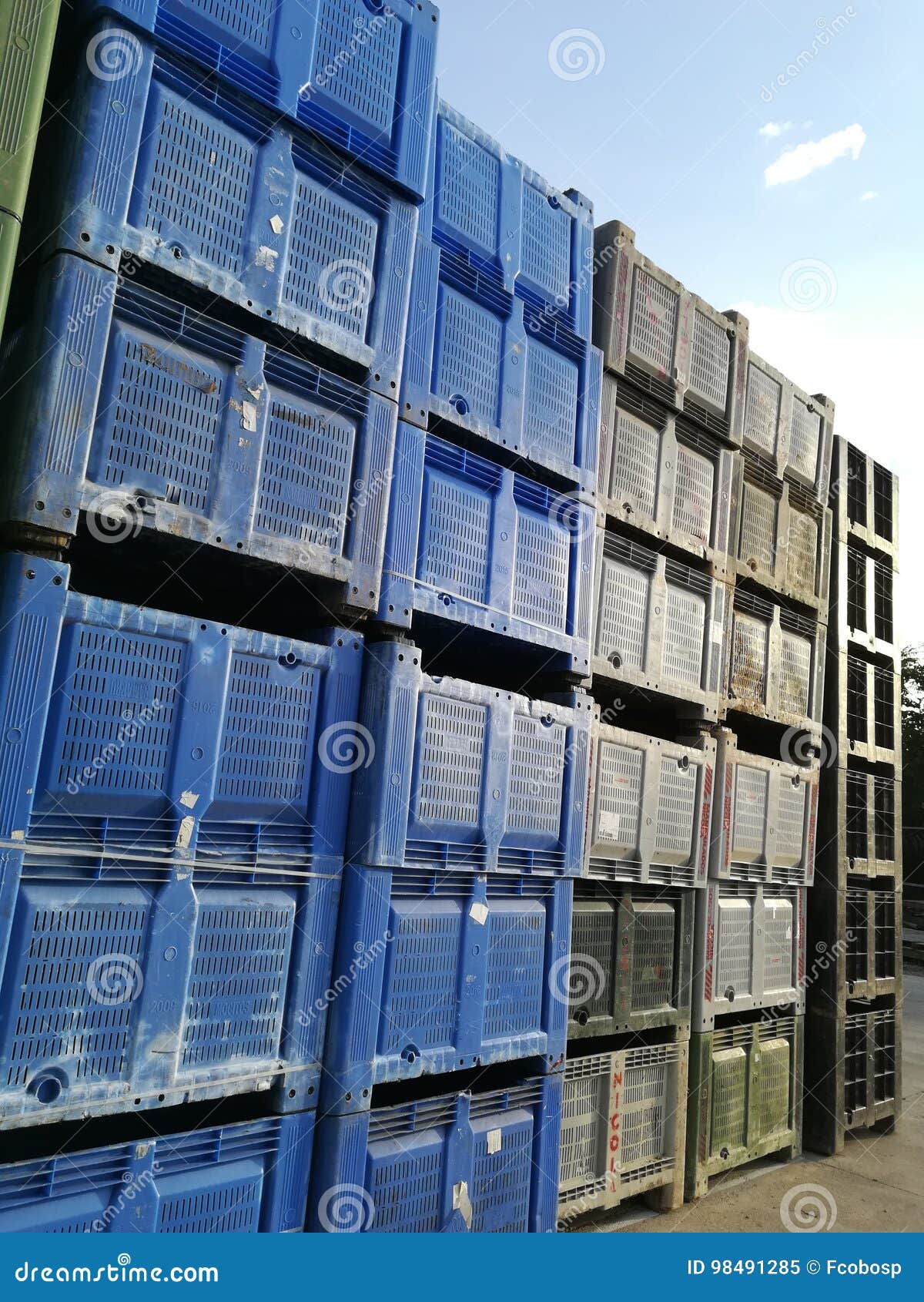 Boxes pallets in a row stock image. Image of warehose - 98491285