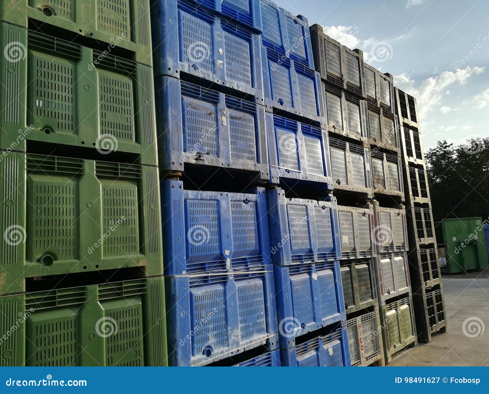 Boxes pallets in a row stock image. Image of warehose - 98491627