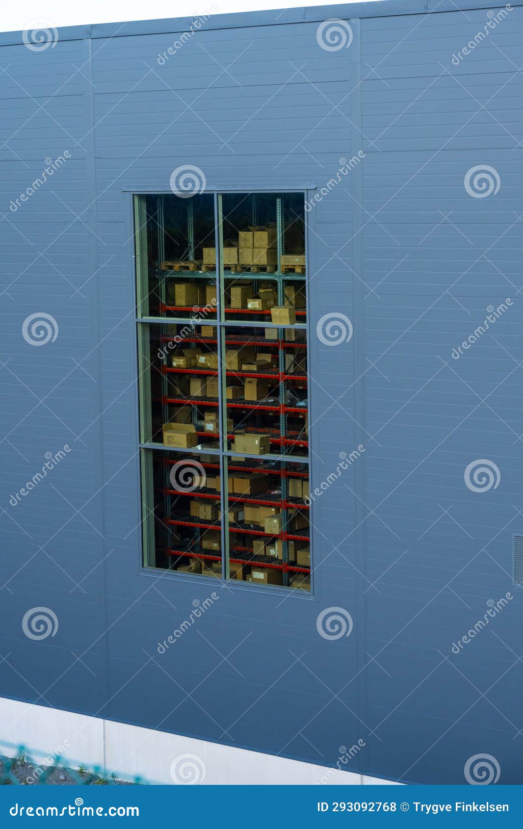 Boxes and Pallets Visible through a Window at a Large Warehouse.. Stock ...