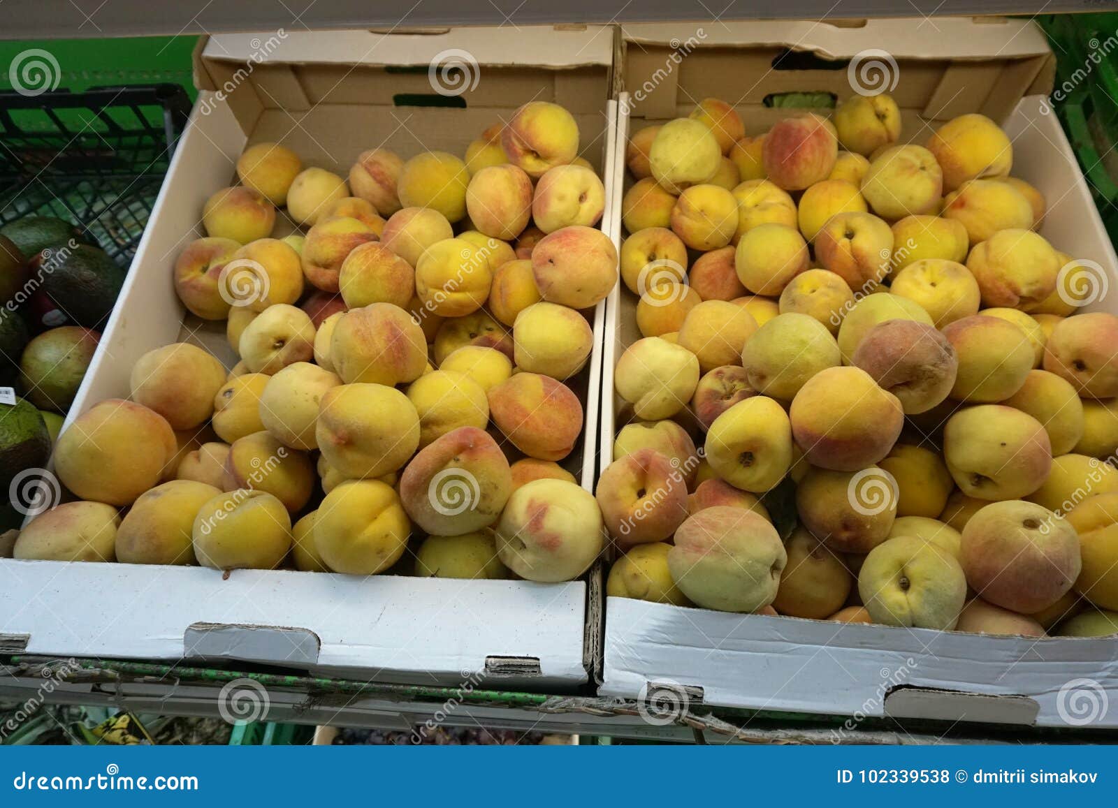 Boxes of Peaches on the Shelf in the Store Stock Photo - Image of logo ...