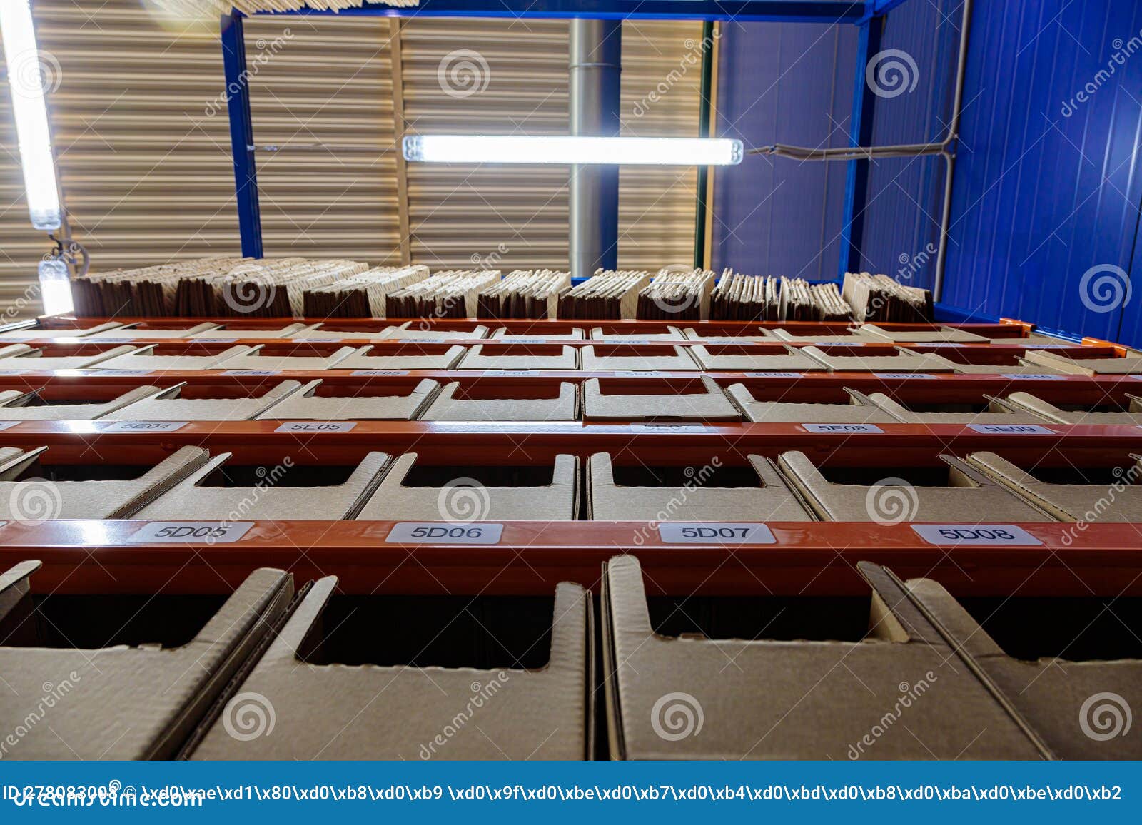 Boxes on Racks in a Warehouse of Goods Close-up. Stock Photo - Image of ...