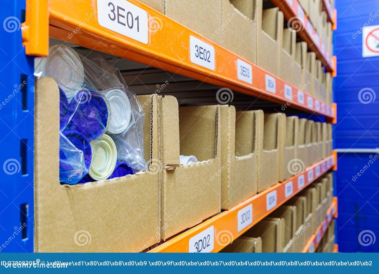 Boxes on Racks in a Warehouse of Goods Close-up. Stock Photo - Image of ...