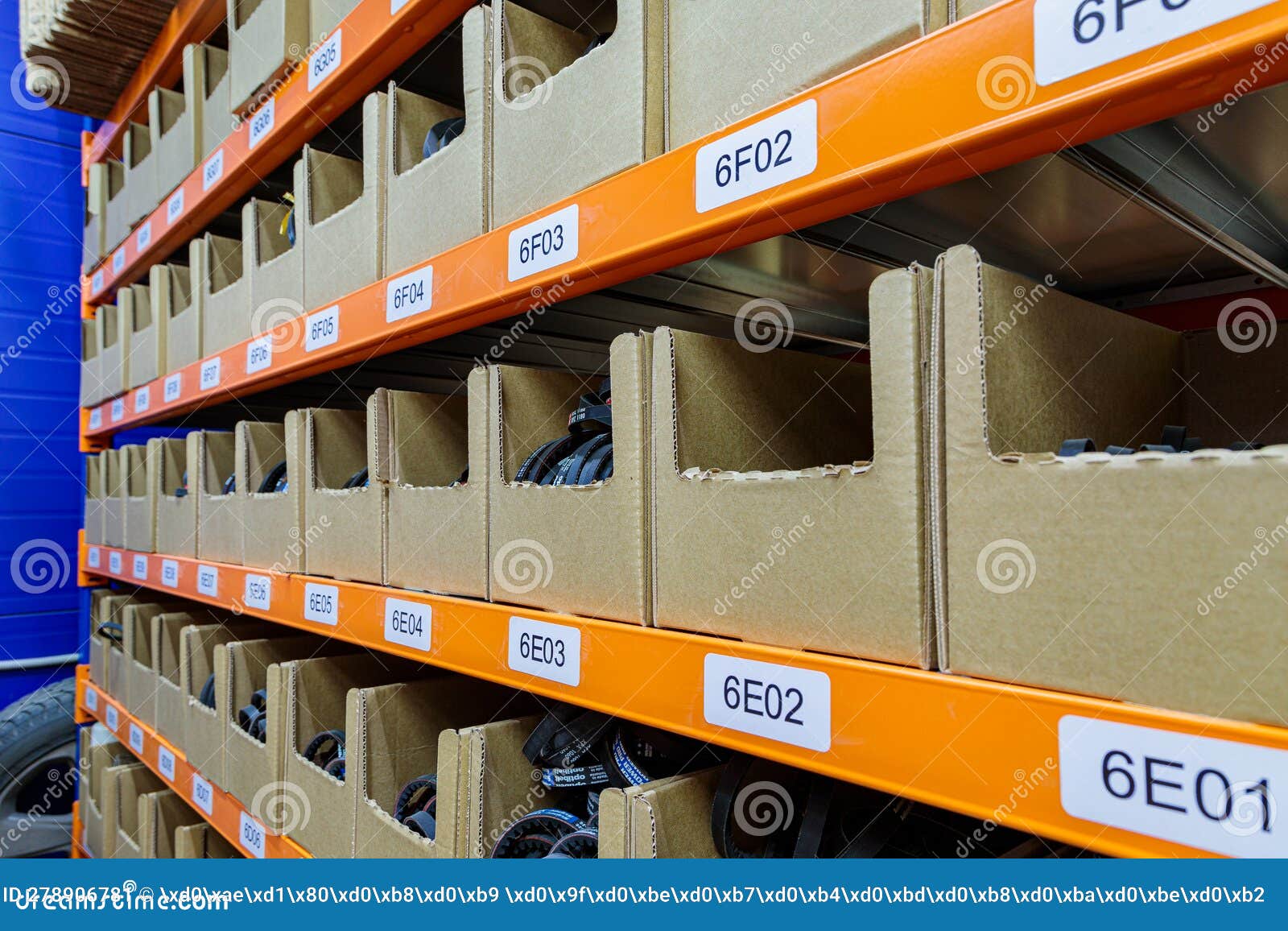 Boxes on Racks in a Warehouse of Goods Close-up. Stock Image - Image of ...