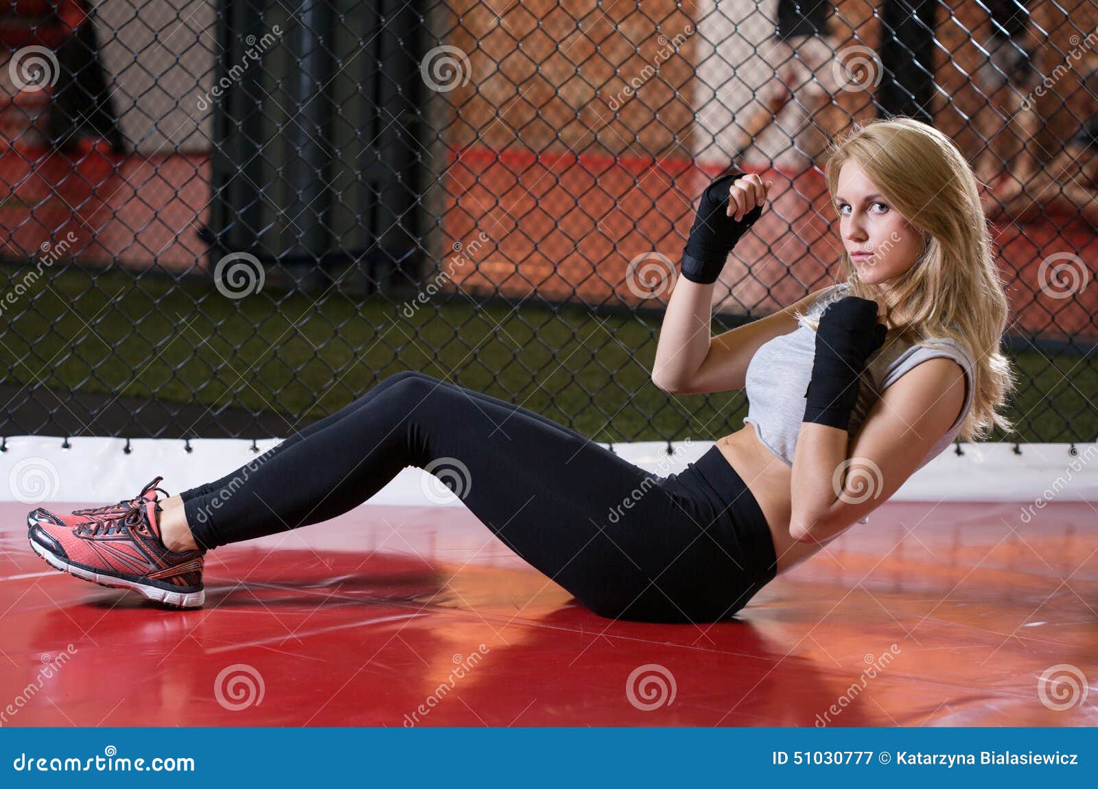 Boxing woman doing crunch stock image. Image of muscular - 51030777