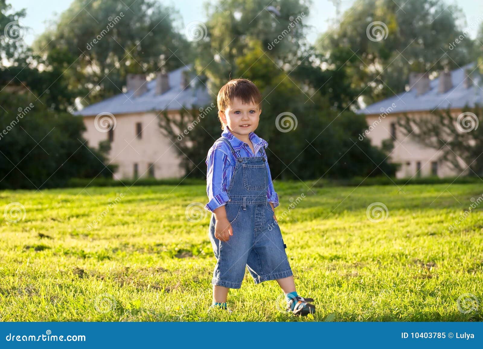 Boy stock image. Image of small, walks, smile, jeans - 10403785