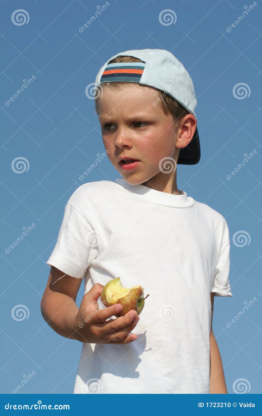 Boy stock photo. Image of thinking, apple, eating, food - 1723210