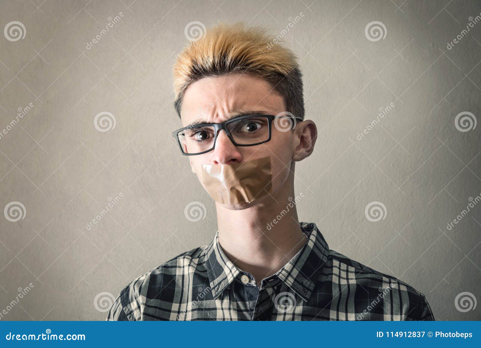Young Man with Adhesive Tape on Mouth Stock Image - Image of portrait ...