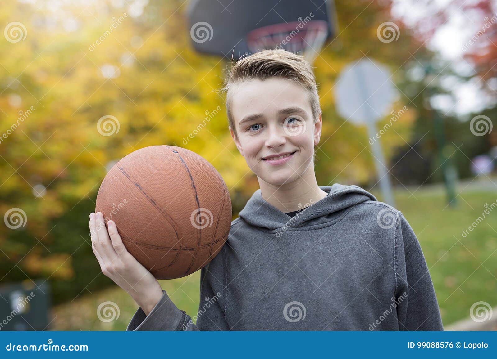 Boy Alone during Basketball Game Outside Stock Photo - Image of outside ...