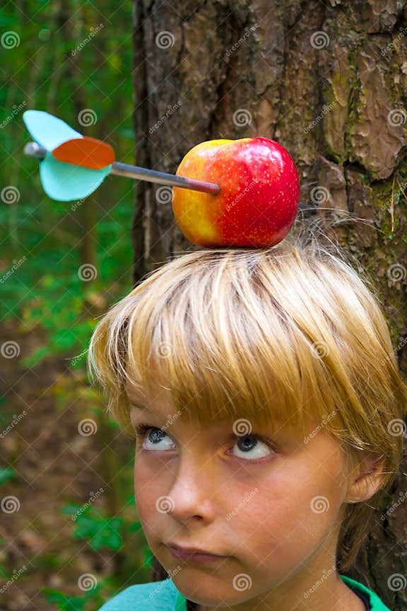 Boy with apple on head stock image. Image of child, arrow - 27447193