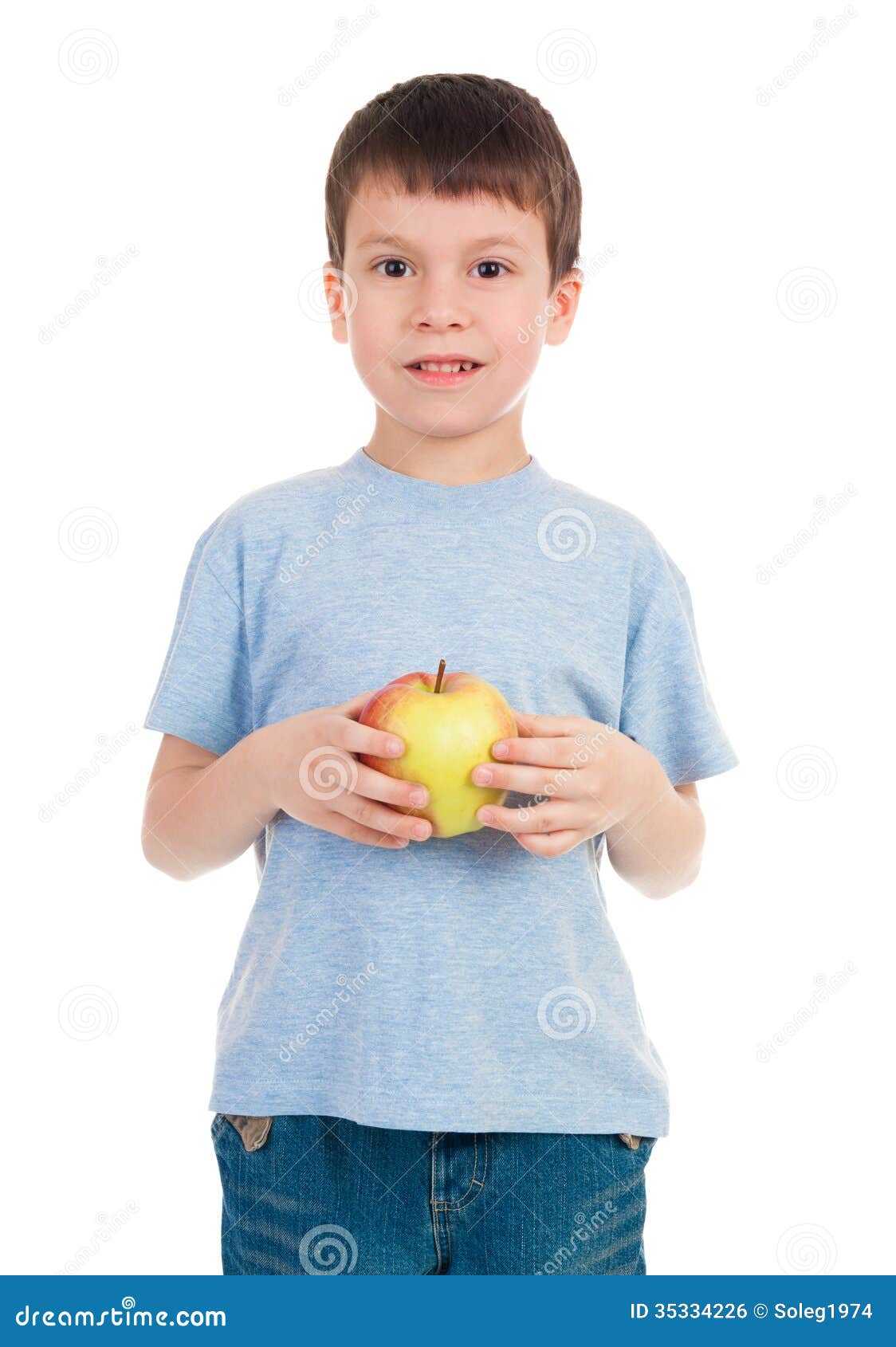 Boy with apple isolated stock photo. Image of jeans, fruit - 35334226